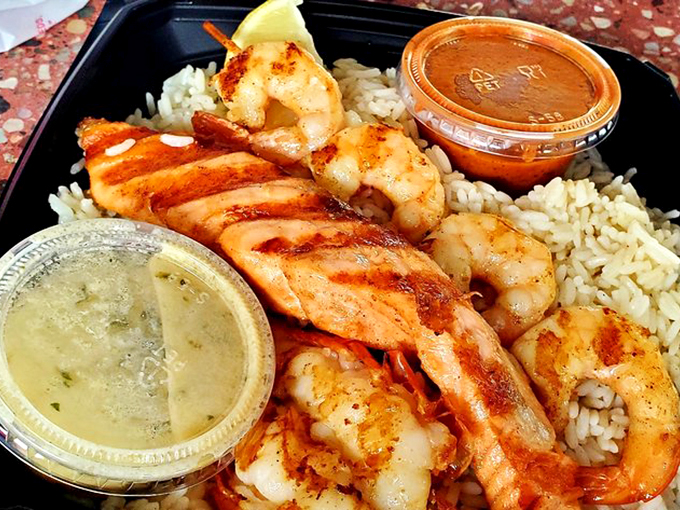The seafood sampler that answers the eternal question: "Why choose one when you can have it all?" Rice never had such distinguished company.