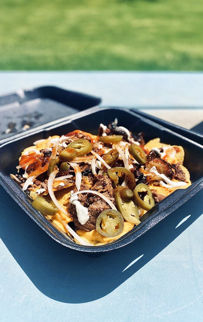 BBQ nachos: where Tex-Mex meets smokehouse in a beautiful collision of cultures. Those jalape&ntilde;os aren't just garnish&mdash;they're exclamation points in this flavor sentence.