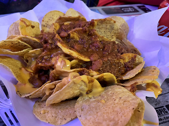 Nachos that don't apologize for being exactly what they should be &ndash; a glorious mess of chips, chili, and cheese that demands to be shared.