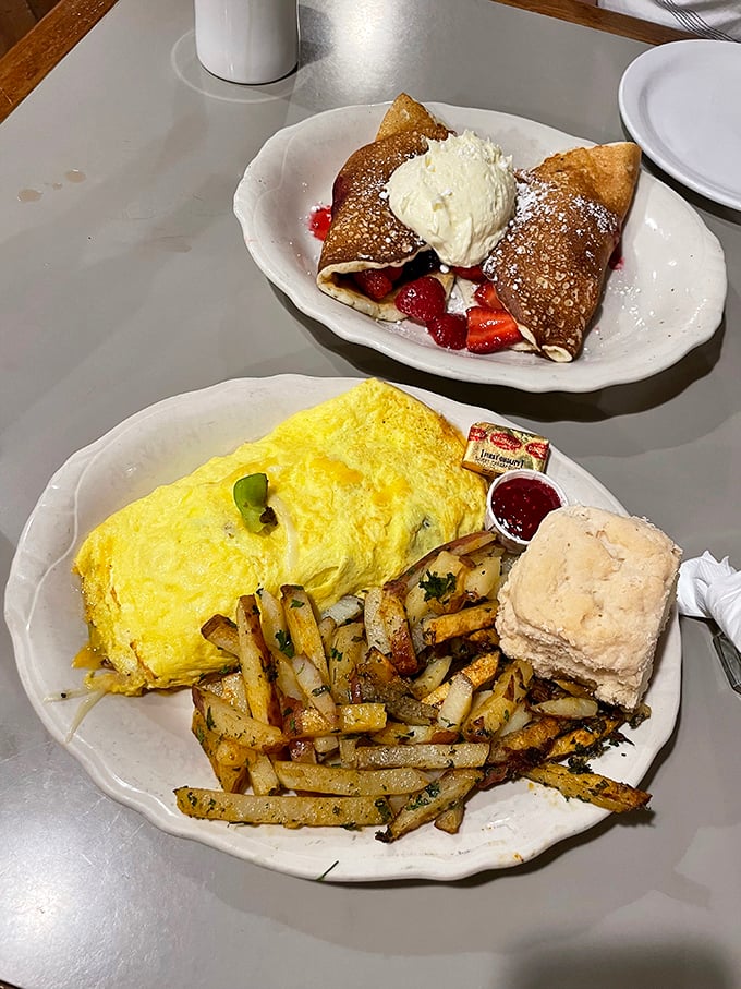 The breakfast equivalent of having your cake and eating it too&mdash;a fluffy omelet alongside Swedish pancakes stuffed with fresh berries.