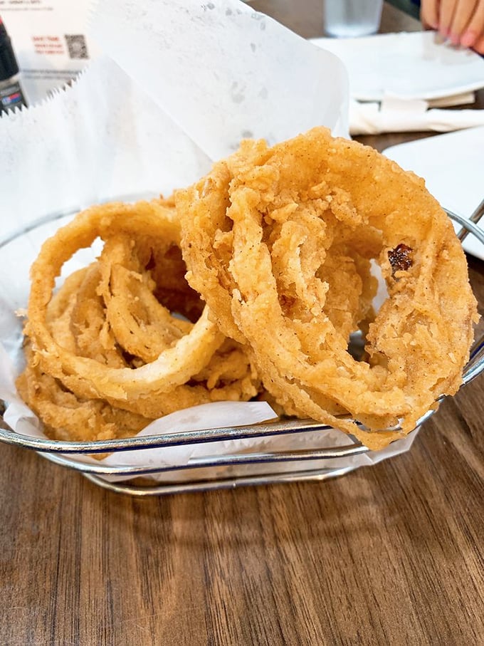 These onion rings aren't just fried&mdash;they're golden halos of crispy perfection that make you wonder why vegetables ever bother showing up any other way.