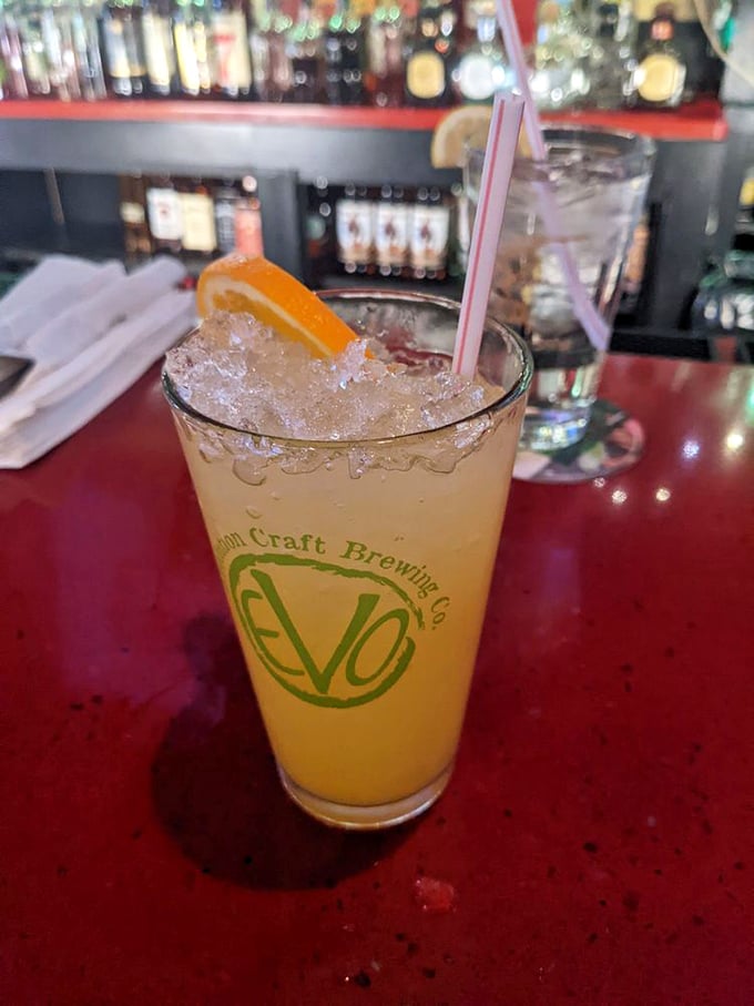 That orange crush isn't just a drink&mdash;it's summer in a glass. Maryland's unofficial cocktail looks right at home on Jennings' classic red bar top.