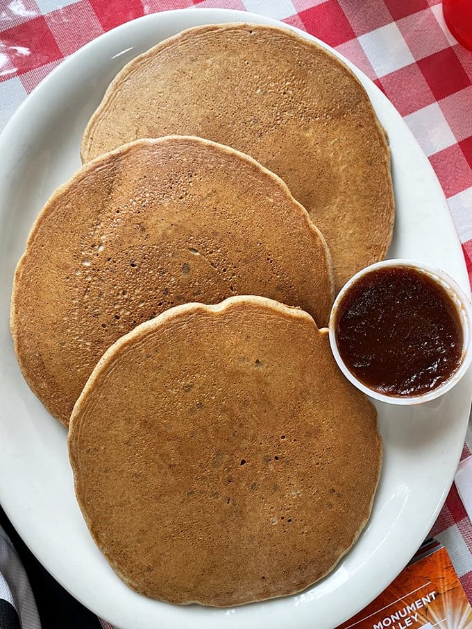 These pancakes aren't just breakfast, they're edible therapy&mdash;golden-brown canvases waiting for that apple butter's sweet embrace.
