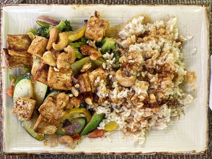 Who knew vegetables could party this hard? Tofu and veggies dance with cashews and peanuts in a celebration of plant-based deliciousness.