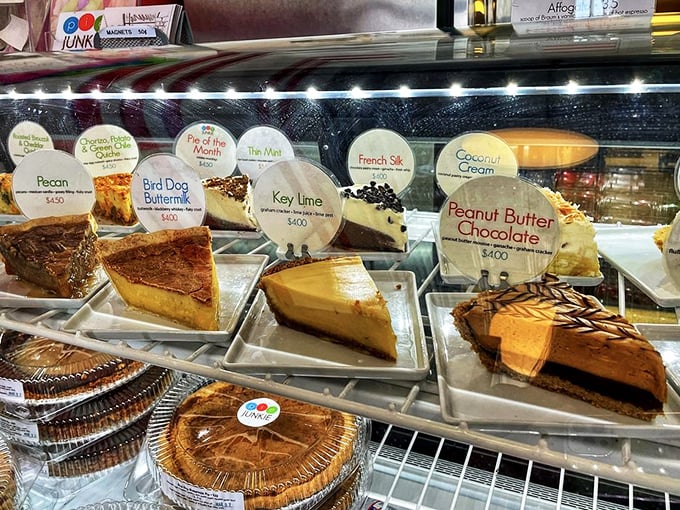 The display case doubles as a museum of edible art, with each pie silently whispering, "Pick me, pick me!"