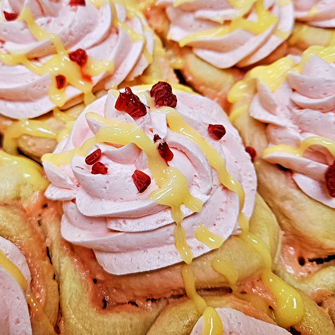 Pink frosting swirls toward heaven while lemon drizzle adds zingy brightness&mdash;dessert masquerading as breakfast never looked so innocent.