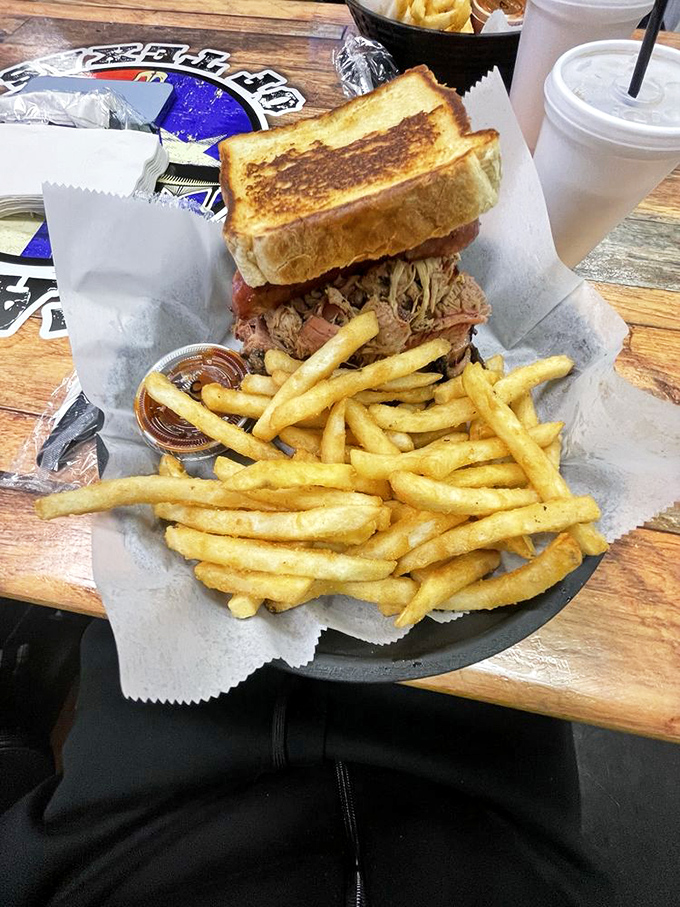 The Pitmaster Deluxe: where French fries are merely supporting actors in a barbecue blockbuster. This sandwich deserves its own IMDB page.