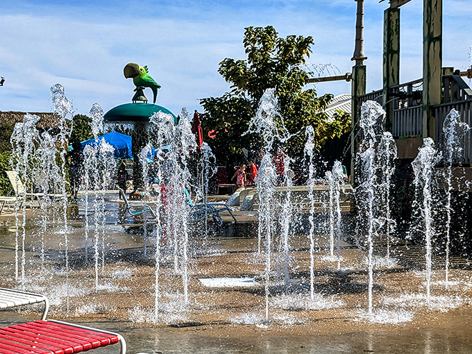 Fountains create an impromptu dance of water for delighted youngsters &ndash; childhood joy in its purest, most refreshing form.