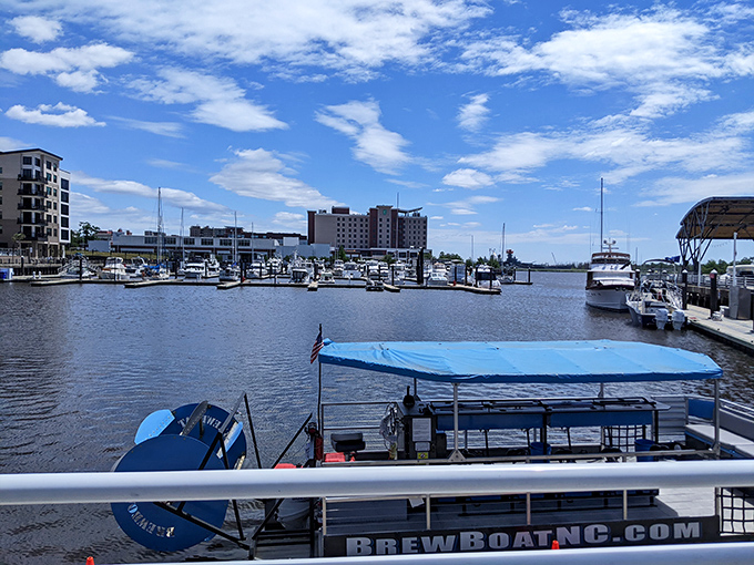 Port City Marina offers a front-row seat to Wilmington's nautical charm, where boats bob gently and "BrewBoat" promises adventures afloat.