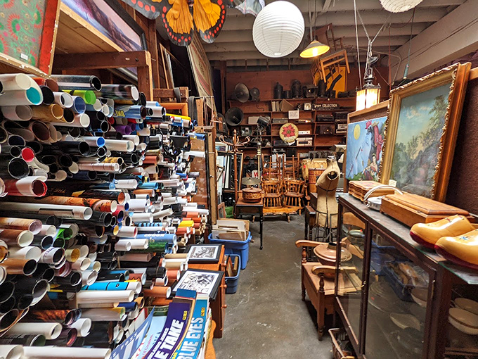 Rolled posters and art supplies await their next creative mission. In this corner, even blank canvases tell stories of possibilities.