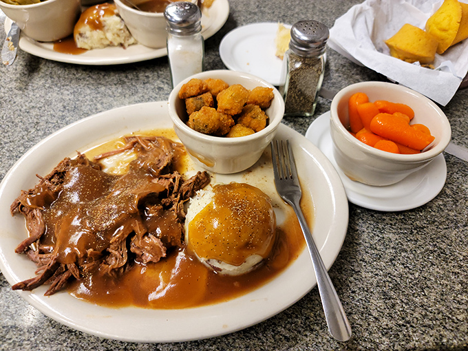 If pot roast could tell stories, this one would narrate an epic tale of patience, gravy mastery, and why dinner at grandma's will always beat five-star restaurants.