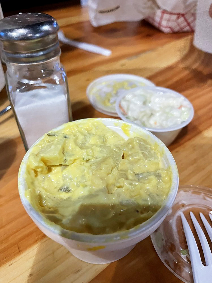 Creamy potato salad stands ready for duty&mdash;the dairy cavalry that might save your mouth when the heat gets too real.
