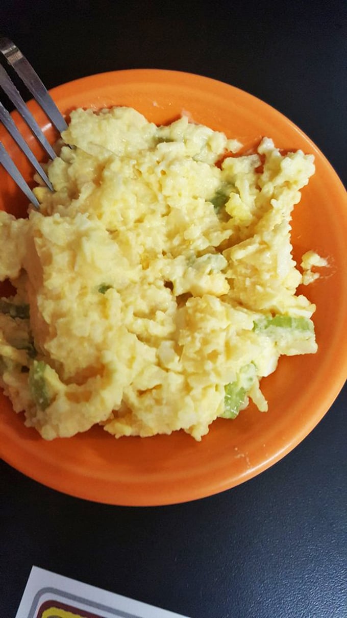 Scrambled eggs that look like they've been whispered into existence&mdash;fluffy, tender, and studded with just enough green pepper for personality.