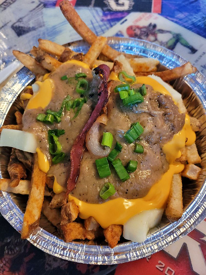Poutine that looks like it was conceived during a fever dream involving Canada, cheese, and gravy-scented hallucinations.