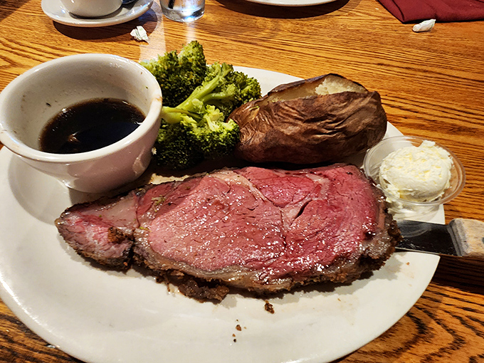 This prime rib isn't just cooked&mdash;it's respected. The perfect pink center surrounded by a seasoned crust is meat meditation at its finest.