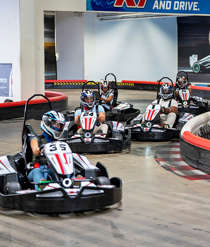 The starting grid—where friendships are temporarily suspended and secret racing personas emerge. That focused look says it all.