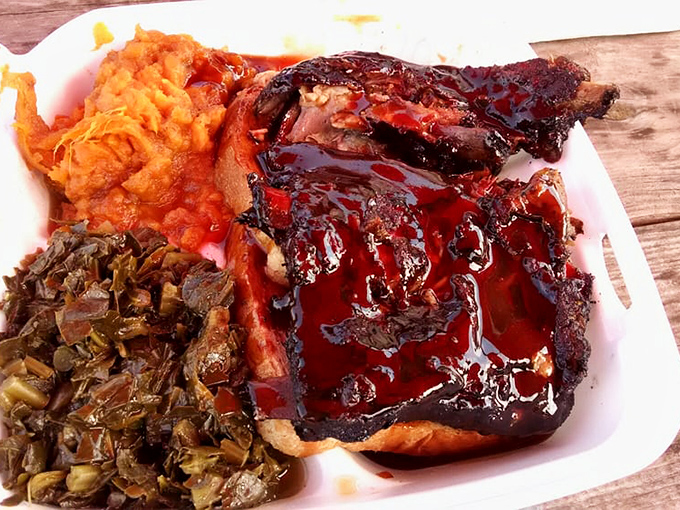 Ribs glazed with sauce that should be illegal in at least seven states. The sweet potato side is practically glowing with Southern comfort.