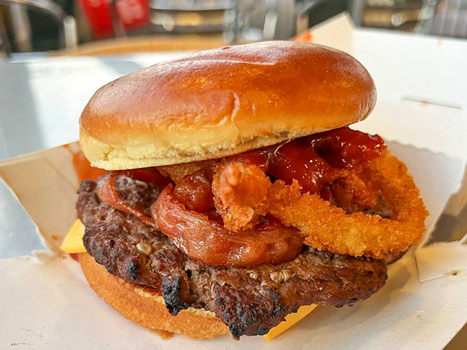 The Rodeo Burger doesn't just tip its hat to the Wild West&mdash;it lassos your taste buds with bacon, BBQ sauce, and those magnificent onion rings.