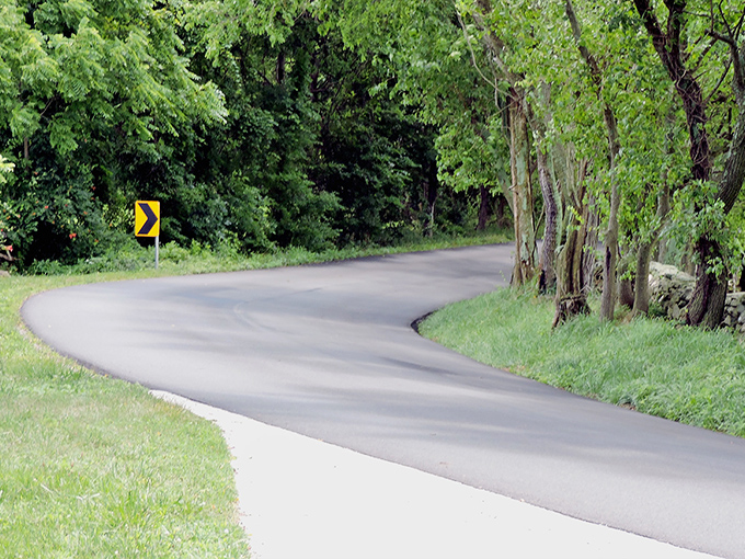 Each curve reveals another postcard-worthy vista, as if the road itself is playing peekaboo with travelers seeking beauty around every bend.