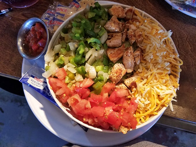 A bowl that proves salads don't have to be punishment&mdash;grilled chicken, fresh veggies, and enough cheese to make a Frenchman weep.