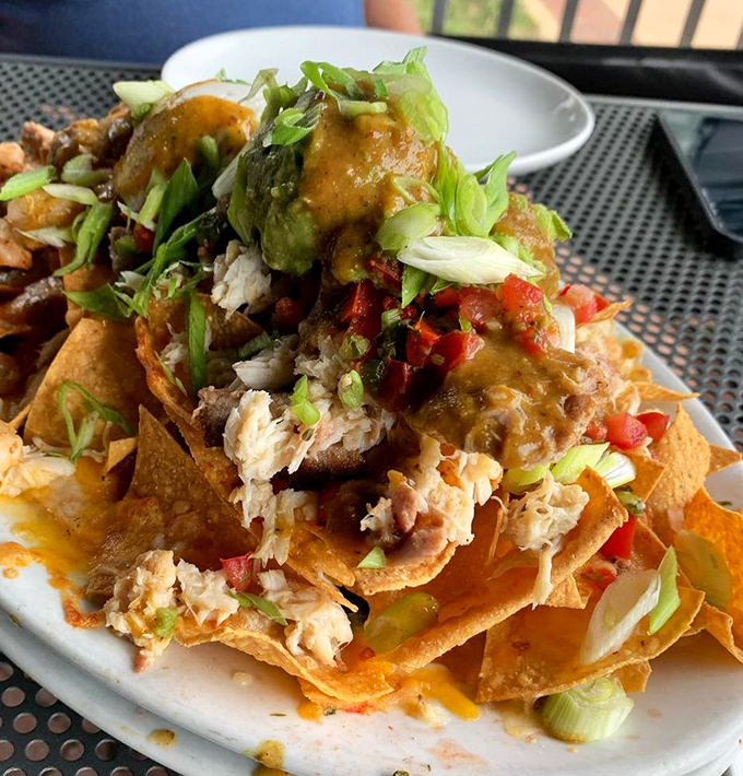 Seafood nachos that make you question why you ever settled for just cheese and jalape&ntilde;os. This is what nachos dream of becoming.