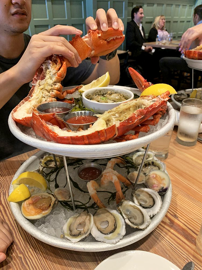 The seafood tower isn't just a meal – it's architecture with benefits. Two tiers of oceanic treasures that make you feel like royalty with every bite.