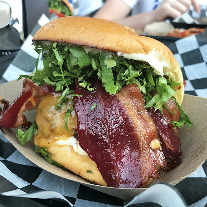 When bacon drapes over a burger like this, it's not an ingredient&mdash;it's a statement of delicious intent.