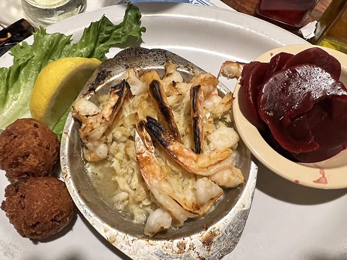 Shrimp and crab served with hushpuppies &ndash; a plate that whispers "Virginia Beach" more eloquently than any travel brochure ever could.