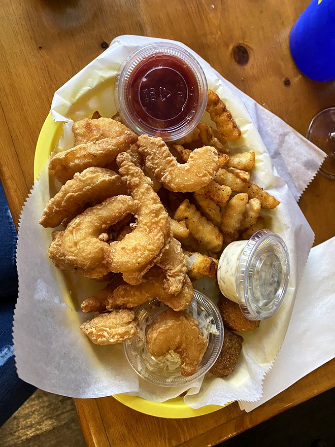 Golden-fried shrimp nestled alongside crispy fries&mdash;comfort food that speaks the universal language of "yes, please."