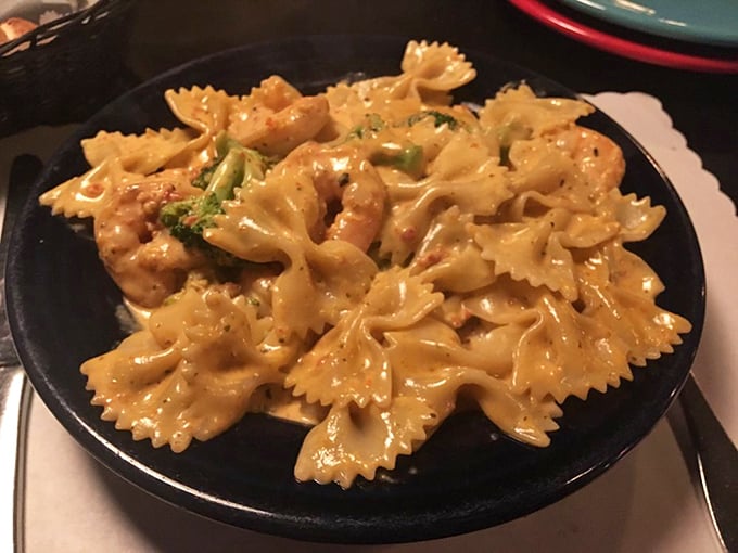 Farfalle pasta swimming in creamy sauce with tender shrimp. This dish proves Some Guys isn't just a one-trick pizza pony.