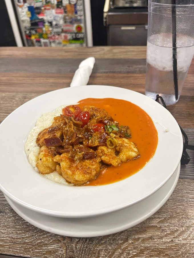 These shrimp and grits aren't just a dish&mdash;they're a Southern baptism. That tomato gravy could make a grown person weep with joy.