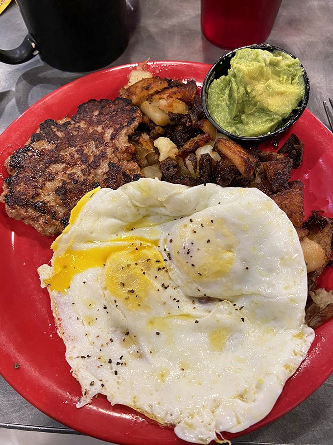 A breakfast plate that demands your full attention&mdash;perfectly fried eggs with golden yolks ready to create nature's most perfect sauce for those crispy potatoes.