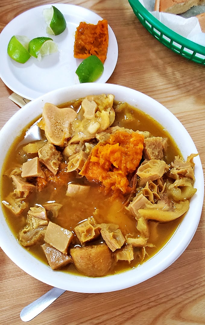 Mondongo soup &ndash; where tripe transforms into treasure. This golden broth with its orange sweet potato islands is comfort in liquid form.