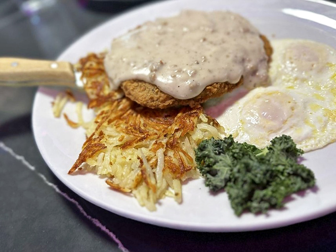 Country fried steak smothered in gravy with hash browns crispy enough to make a satisfying ASMR video. Comfort food that hugs your arteries.