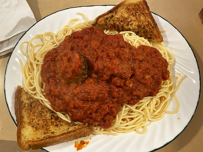 Spaghetti and meatballs: where Italian tradition meets American diner portions, creating a pasta paradise worth every carb-laden bite.