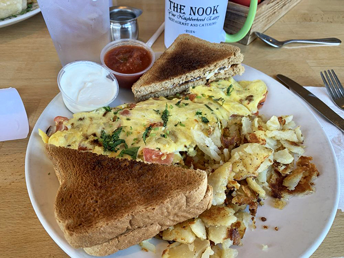 An omelet that's seen things&mdash;namely peppers, sausage, and cheese&mdash;coming together in a skillet symphony that Mozart would have appreciated.