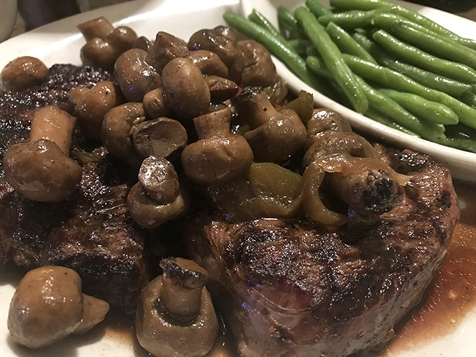 This steak smothered in mushrooms isn't just dinner&mdash;it's therapy. The green beans are there to make you feel virtuous.