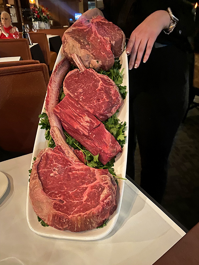 The meat parade! A tableside presentation of prime cuts that makes choosing your steak feel like adopting a new best friend.