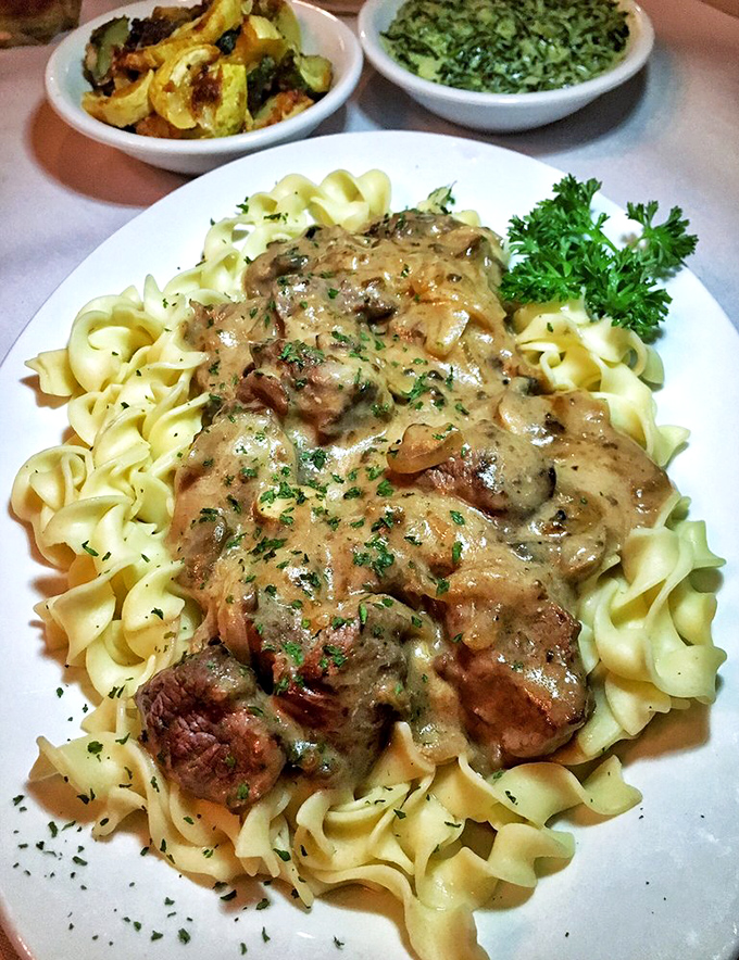Beef Stroganoff over egg noodles&mdash;comfort food that whispers, "Put on your stretchy pants, darling. We're going to need them tonight."