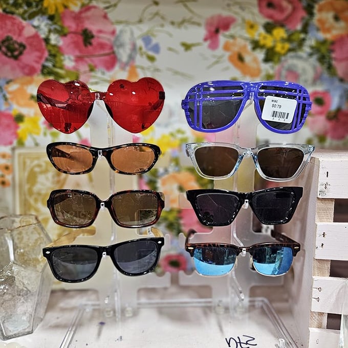 Sunglasses galore! From heart-shaped romantics to cool-blue party starters, each pair hiding stories of vacations, celebrations, and fashion regrets.