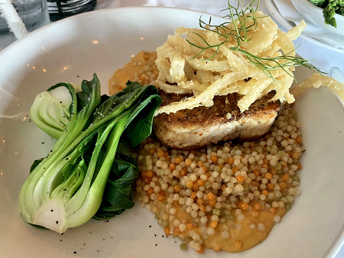 Who says steakhouses are just for carnivores? This swordfish perches atop Israeli couscous like an island of flavor in a sea of possibility.
