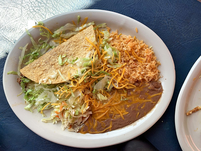 This taco platter doesn't just feed your hunger&mdash;it feeds your soul with perfectly seasoned meat, fresh toppings, and that essential side of rice and beans.