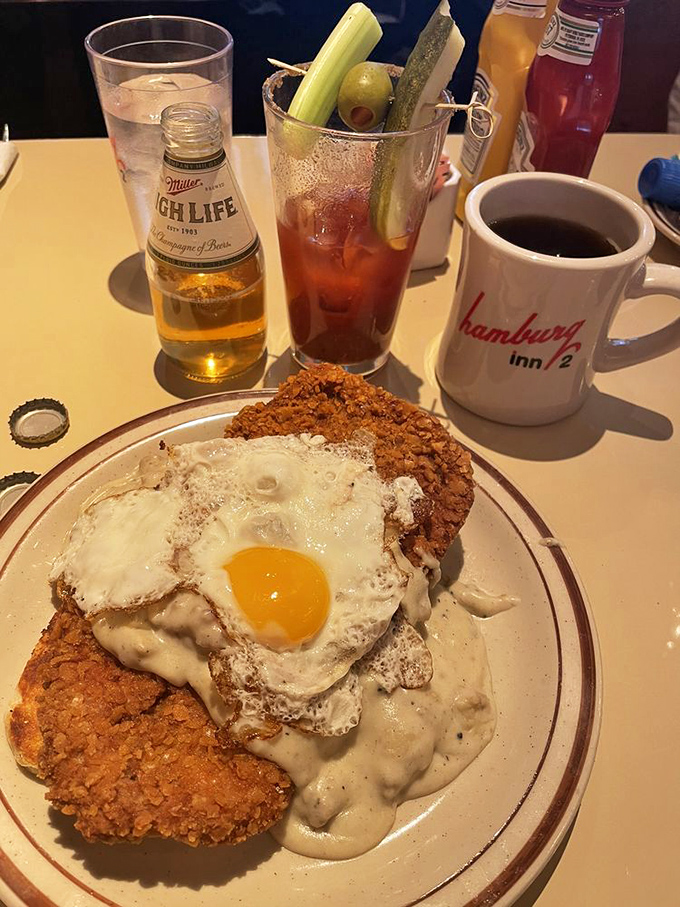 When a tenderloin meets gravy and a perfect egg, magic happens. Those hash browns aren't a side dish&mdash;they're essential supporting characters in this breakfast drama.