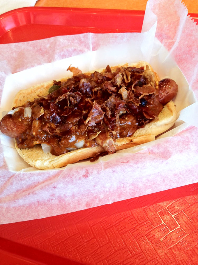 The Texas Dog arrives loaded with enough chili to make a Lone Star State native tip their hat in respect.