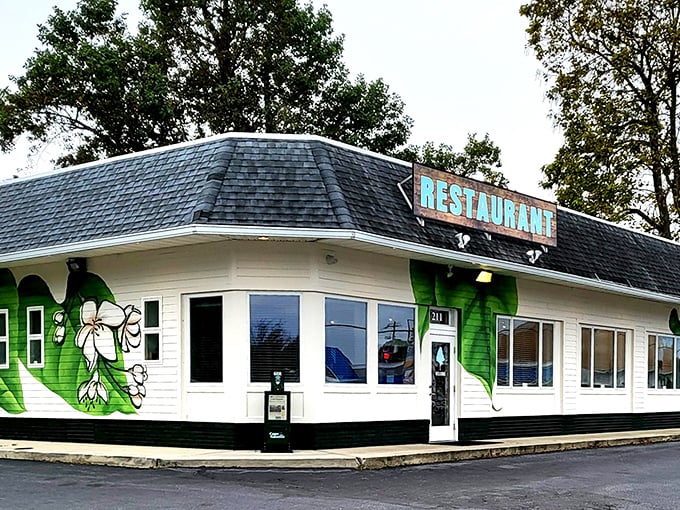 The Backyard's vibrant green exterior and flowery mural promise comfort food with personality&mdash;like your favorite aunt opened a restaurant.