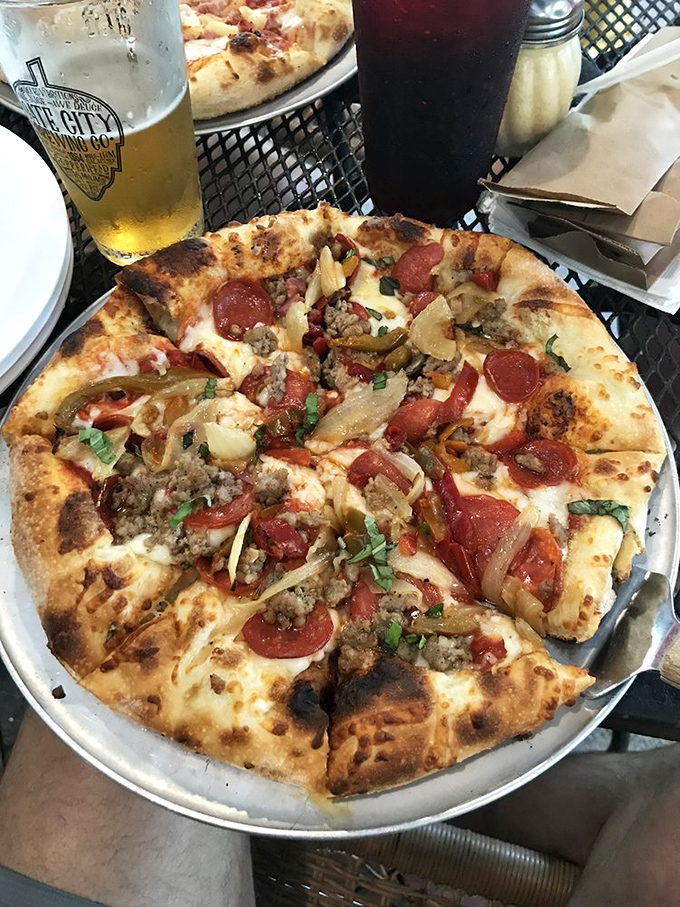 Ground beef, pepperoni, herbs, and that perfectly charred crust. A pizza that makes you want to cancel your afternoon plans for a nap.