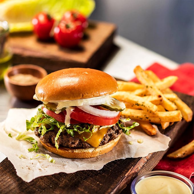 A burger that reminds you why classics became classics. Fresh veggies, melty cheese, and a patty that didn't come from a freezer.