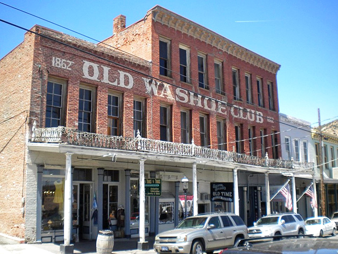 The 1862 Old Washoe Club stands proudly on C Street, its brick facade housing both spirited libations and, some say, actual spirits.