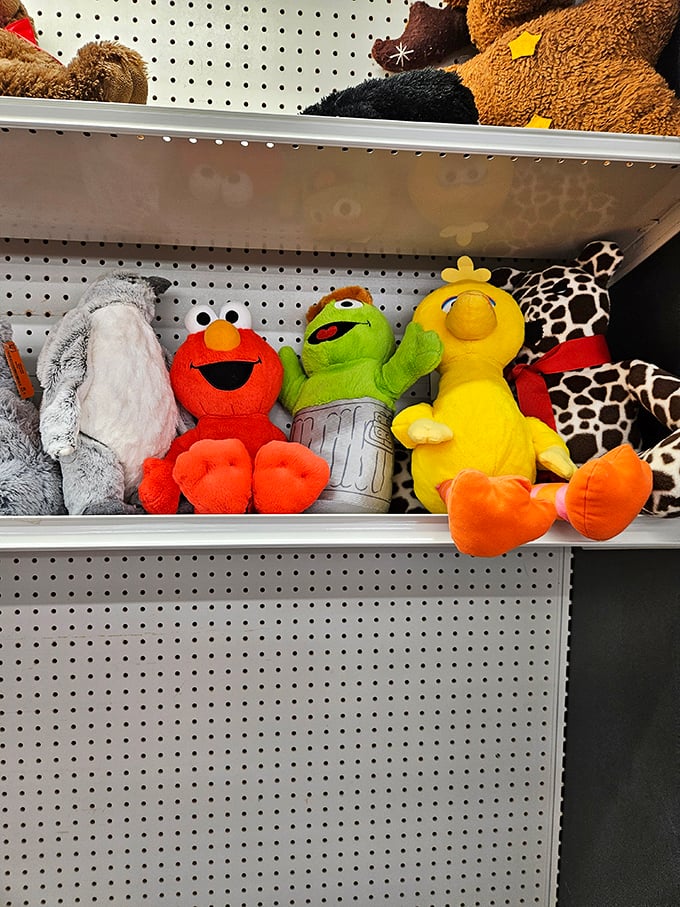 Elmo, Kermit, and Big Bird hold court on the toy shelf, ready to bring joy to a second generation of little hands.