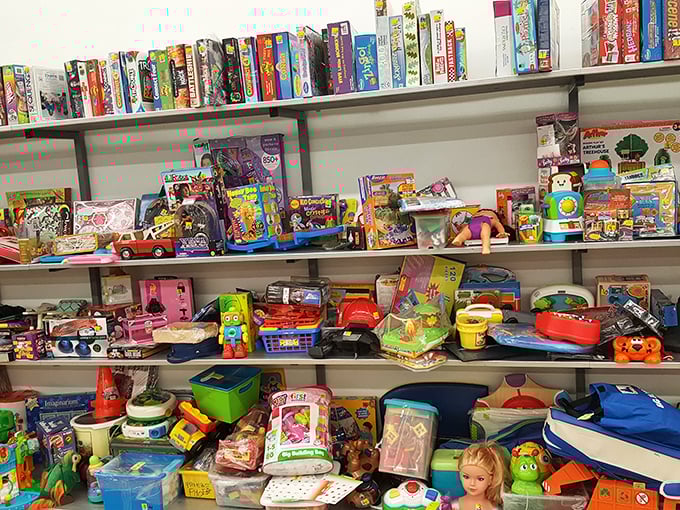 Toy shelves bursting with childhood memories &ndash; where board games missing exactly one piece coexist with dolls waiting for their next tea party.